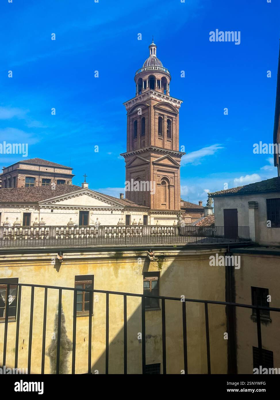 Bell tower of the santa barbara church surrounded by magnificent Mantua ...