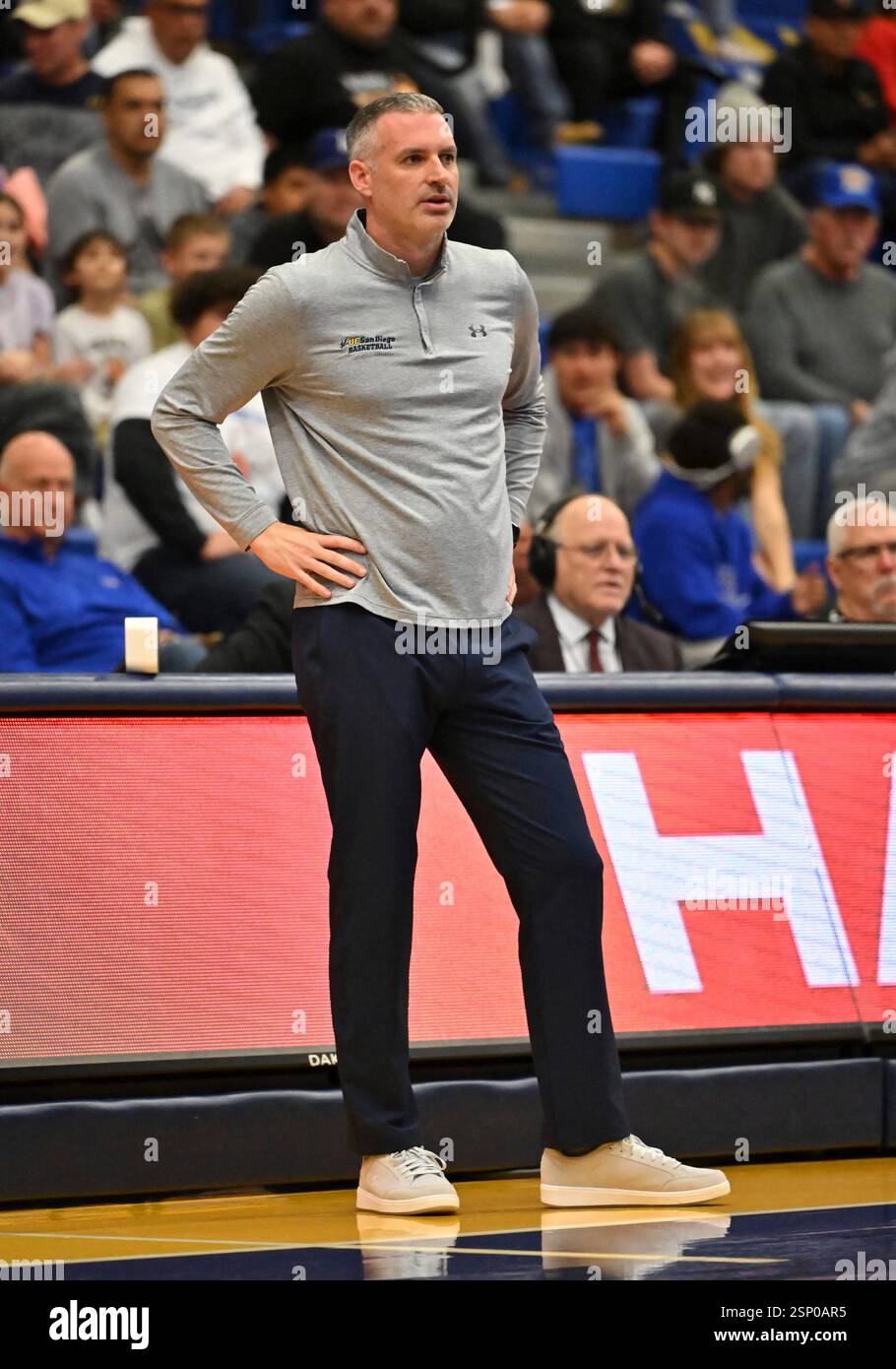 BAKERSFIELD, CA - FEBRUARY 13: UC San Diego Tritons head coach Eric Olen watches game action ...