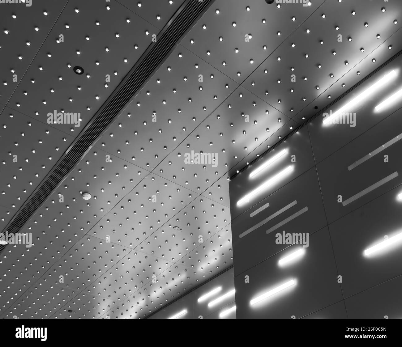 Lights and ventilation system in long line on ceiling of the industrial ...