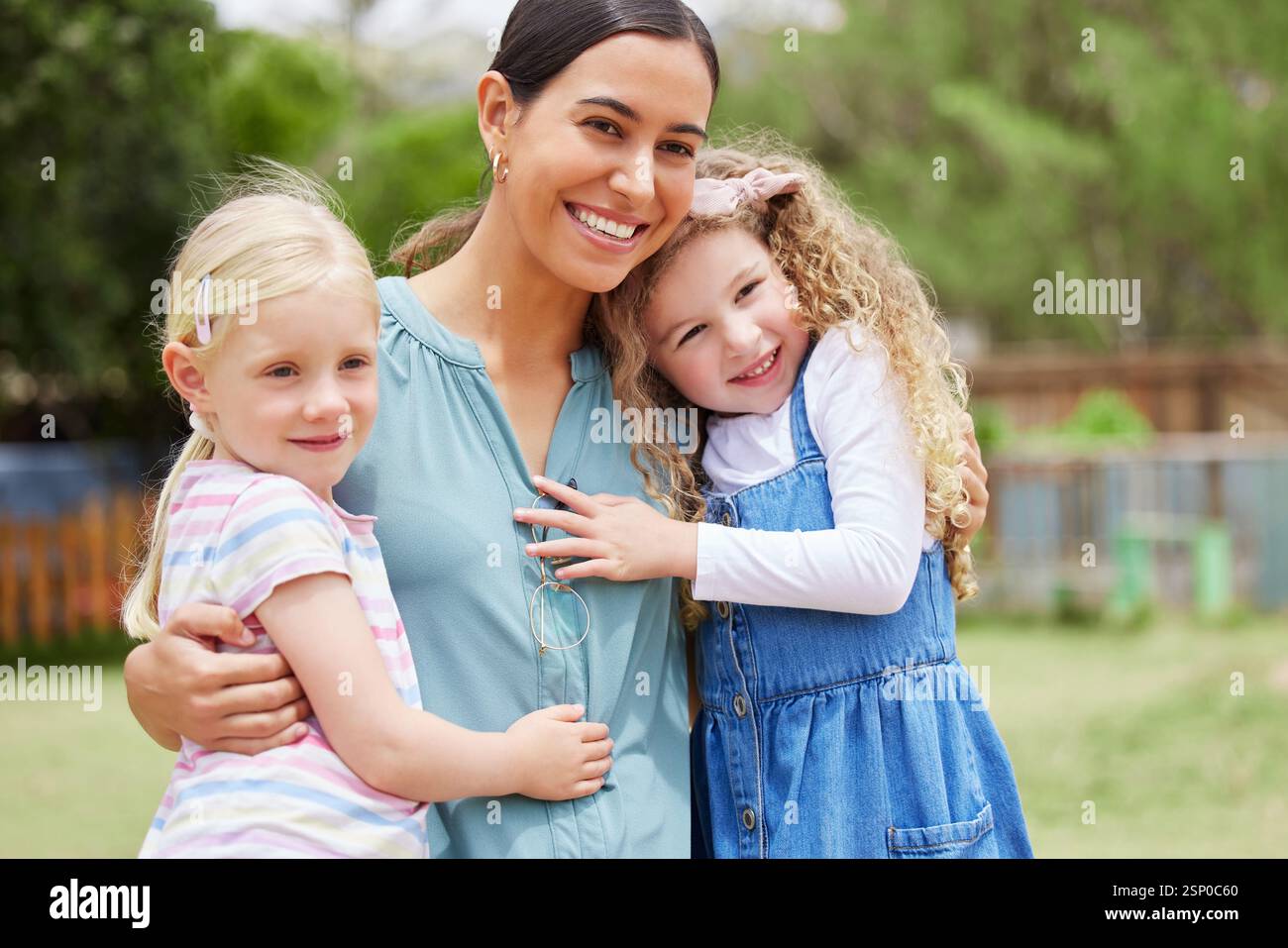 Outdoor, teacher and children with hug for kindergarten, kids growth ...