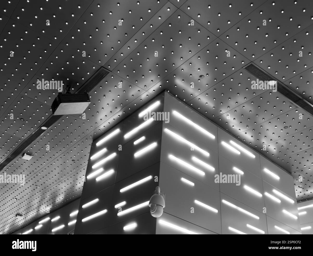 Lights and ventilation system in long line on ceiling of the industrial ...