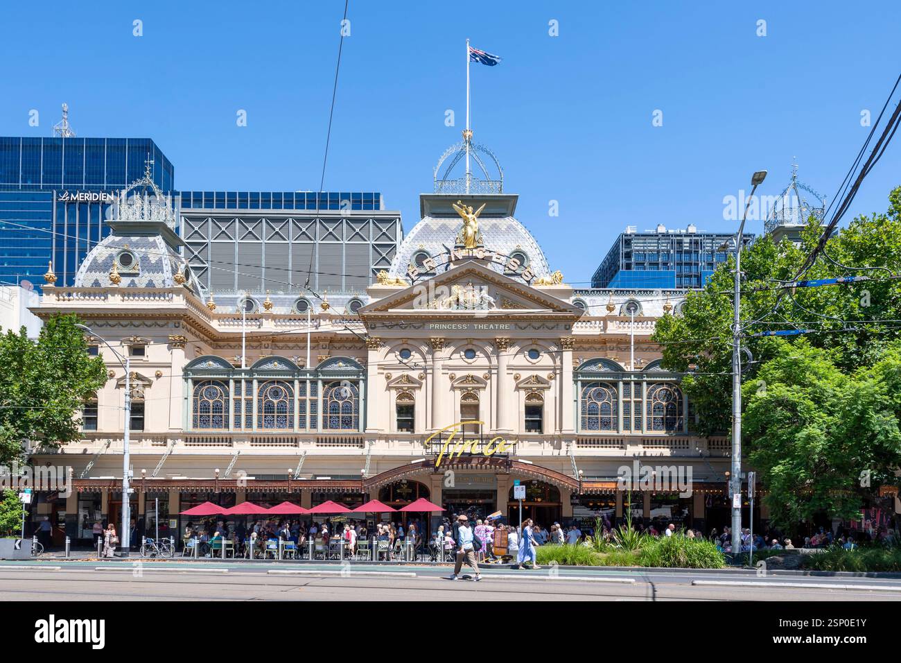 Sunshine highlights golden statues and the Royal Crest adorn the ...