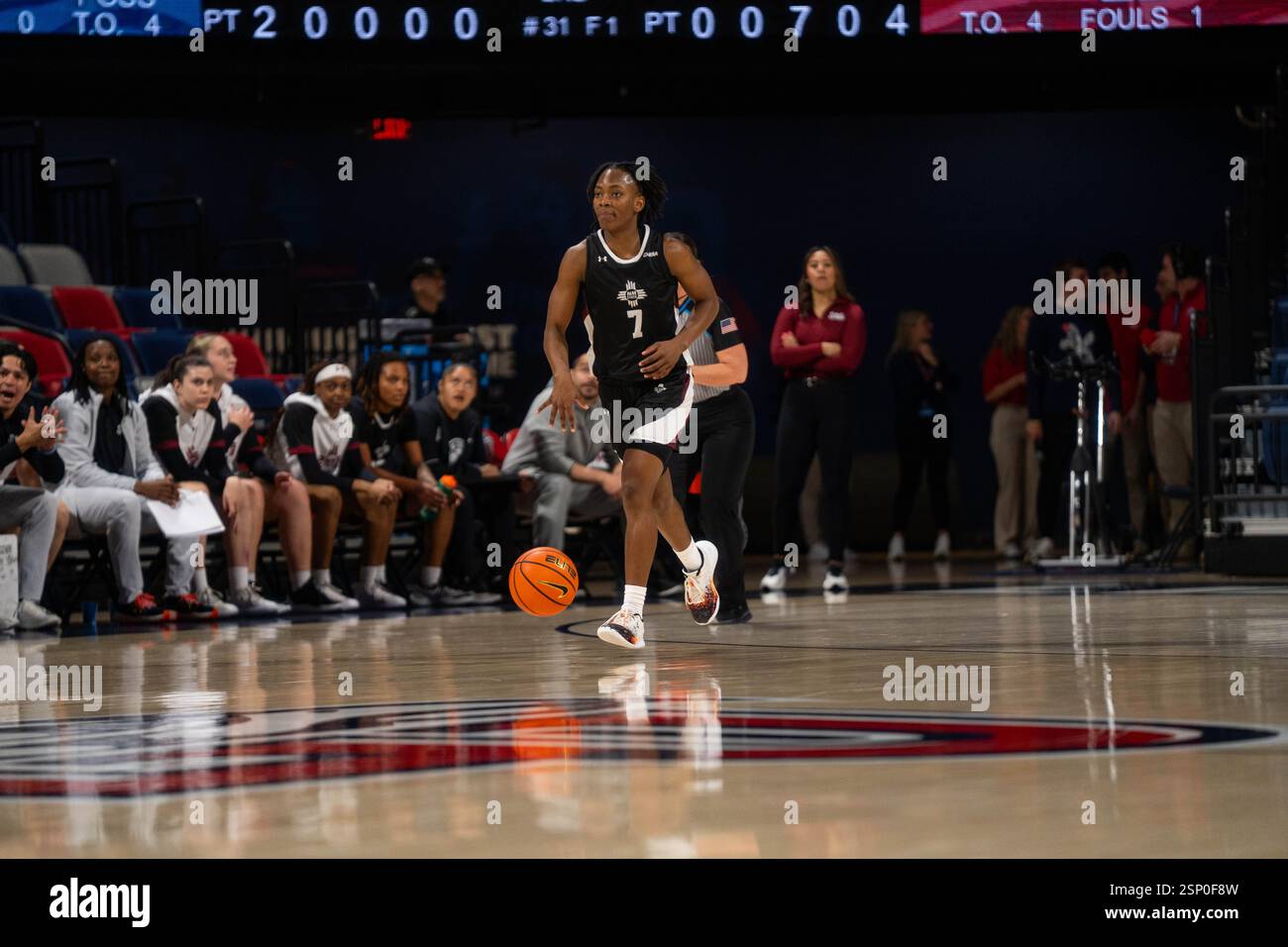 Molly Kaiser #7 of the New Mexico State Aggies dribbles the ball of the ...