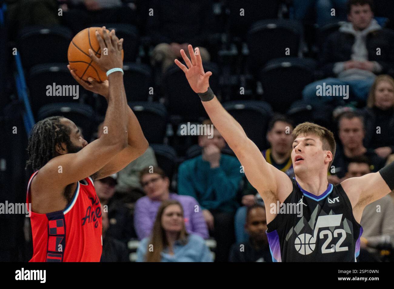 Los Angeles Clippers guard James Harden, left, shoots over Utah Jazz ...