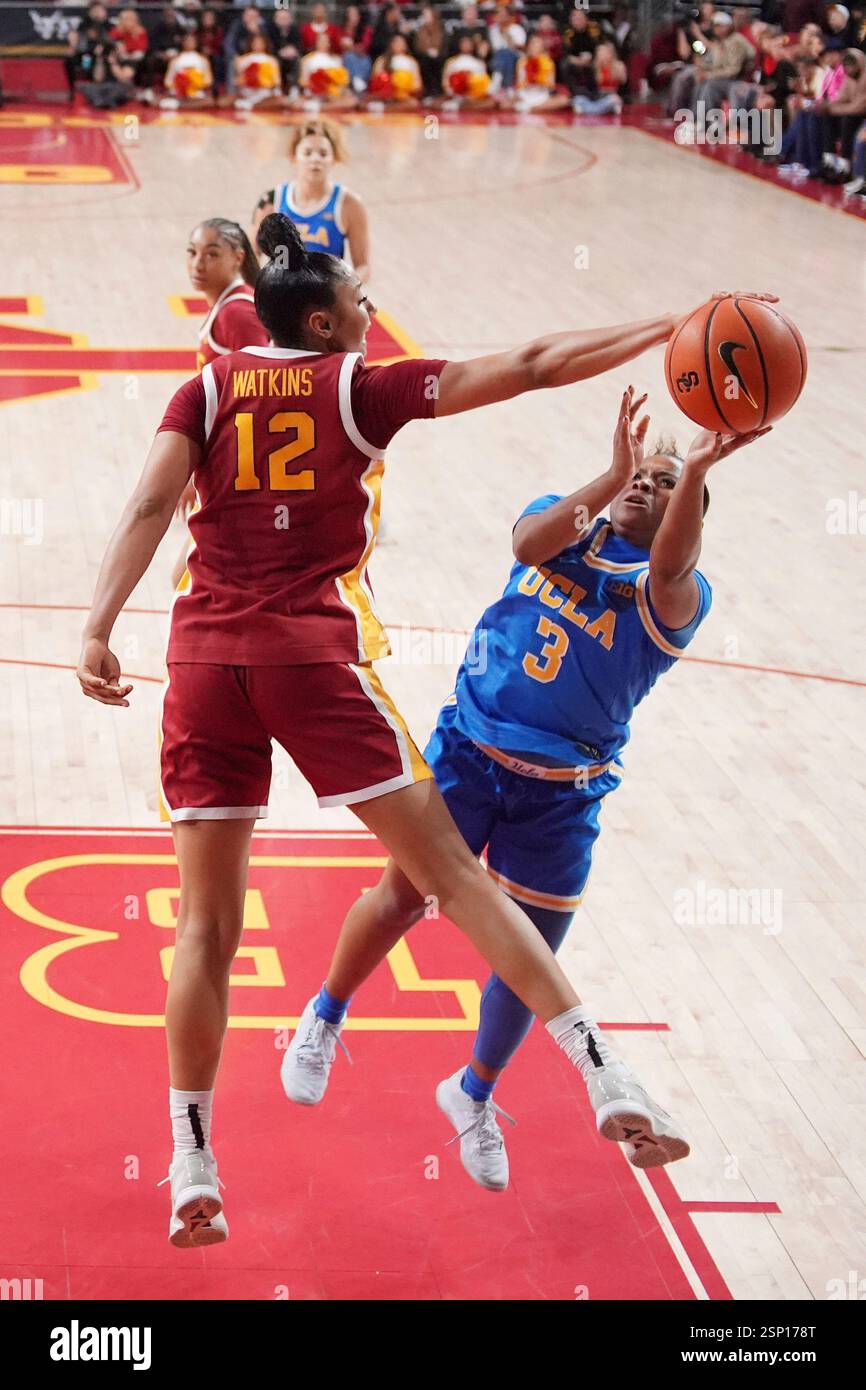 Southern California guard JuJu Watkins, left, blocks the shot of UCLA ...