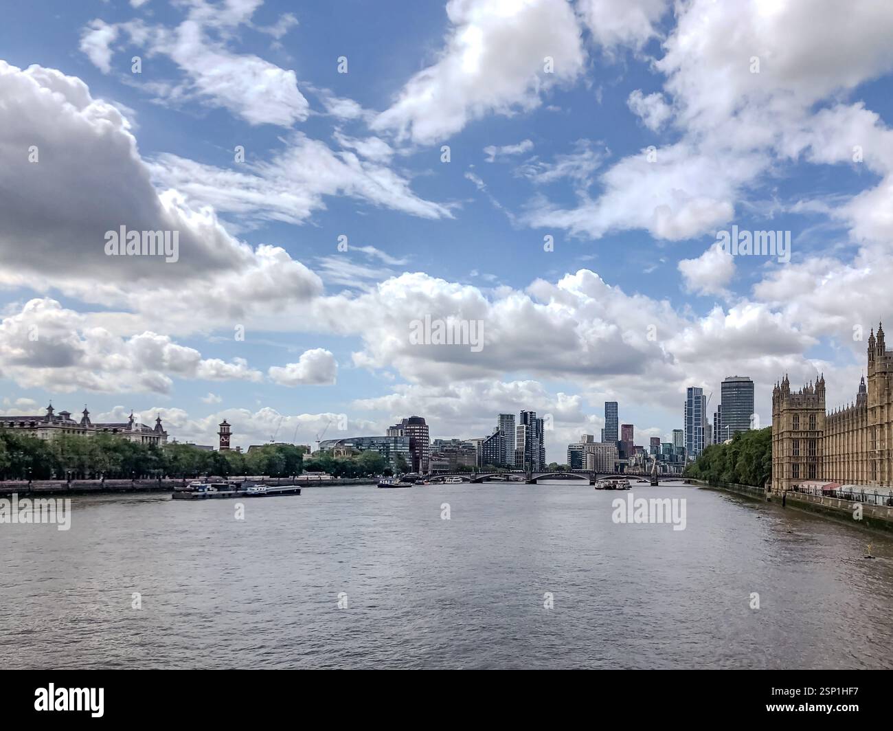 Thames River in London, captured from a bridge with the iconic skyline ...