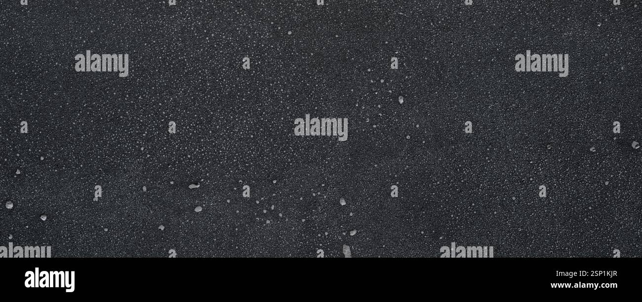 Black concrete texture with a smooth surface and subtle variations in ...