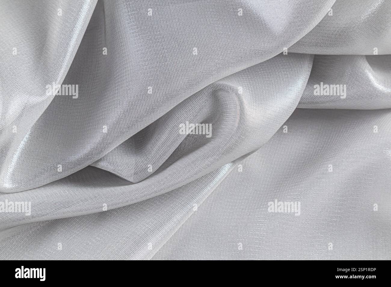 The texture of silk, chiffon transparent fabric is silver colored ...