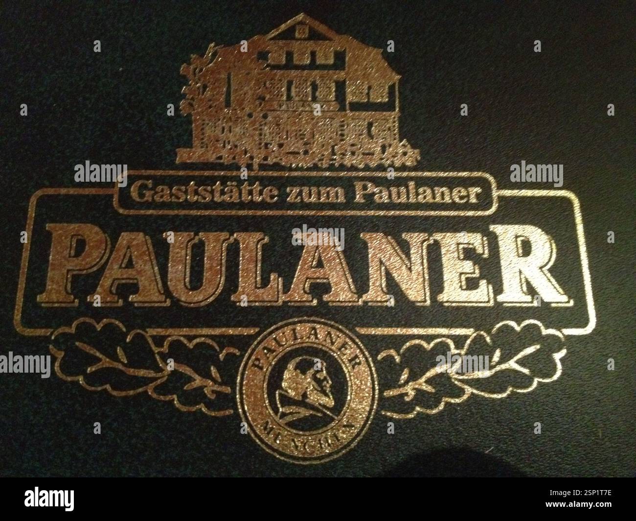 Gaststätte zum Paulaner logo. Golden text on black background. Germany ...