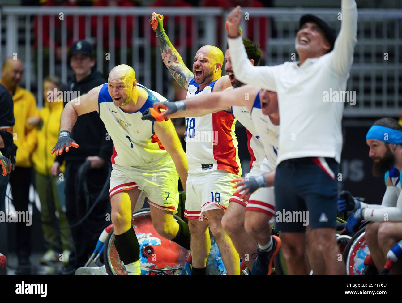 France's Bernard Herard (7) and Raphael Dubois (18) celebrate after defeating the U.K. in the ...