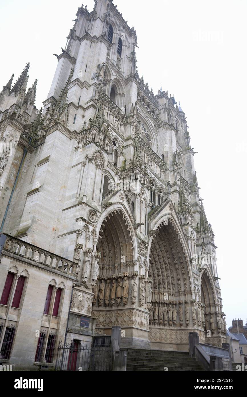 The intricate Gothic facade of Amiens Cathedral in France, featuring ...