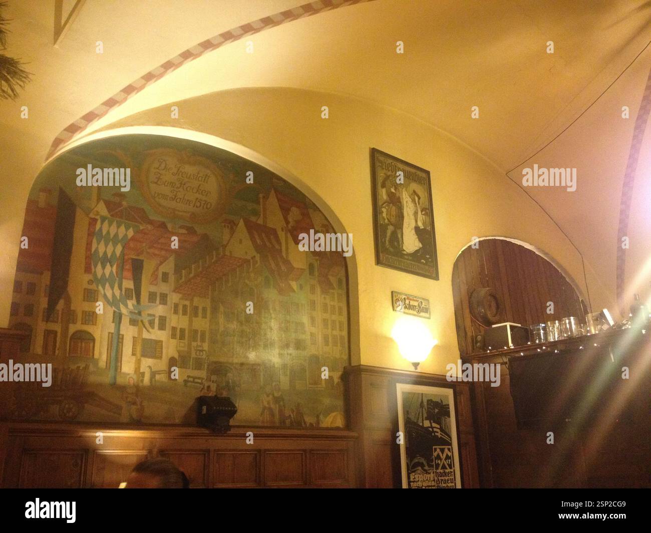 Interior of a German-style pub, Germany, Munich. Ornate ceiling and ...