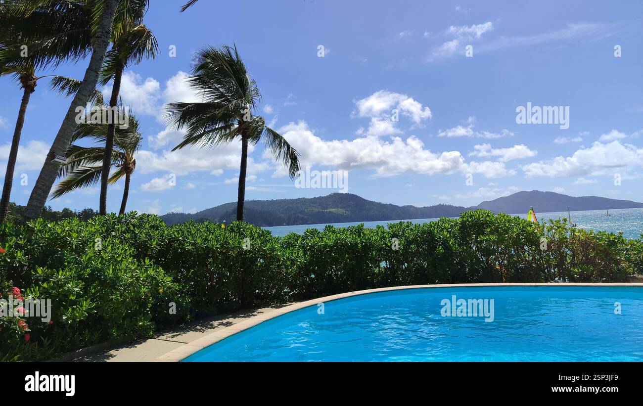 Hamilton Island sanctuary: a crystal-clear pool spills over its edge ...