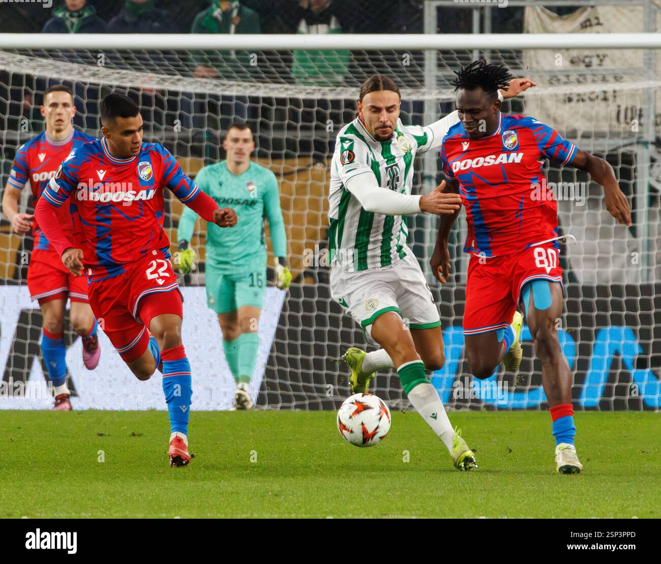 Budapest, Hungary. 13th February, 2025. Cadu of FC Viktoria Plzen (l) and Prince Kwabena Adu of ...