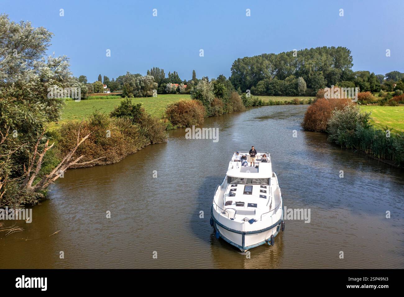 Rental boat in the Lys river between Deinze and Gent, Flanders, Belgium ...