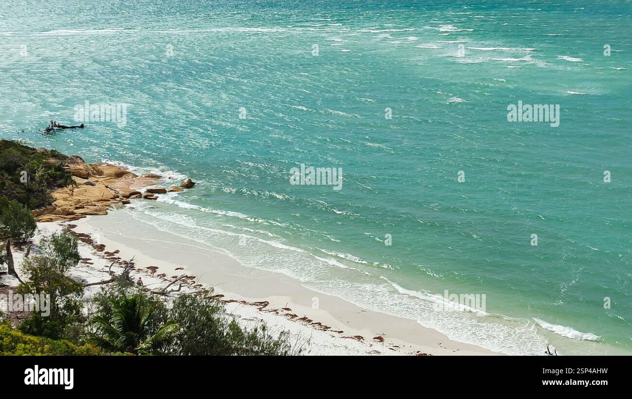 Calm turquoise waves gently lap hi-res stock photography and images - Alamy