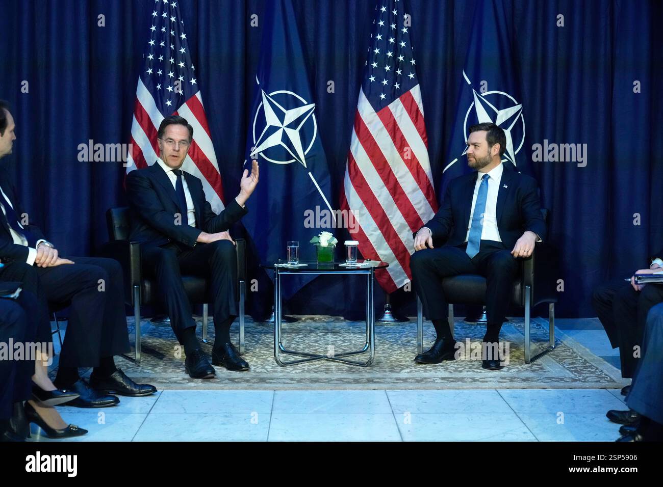 United States Vice-President JD Vance, right, and NATO Secretary ...