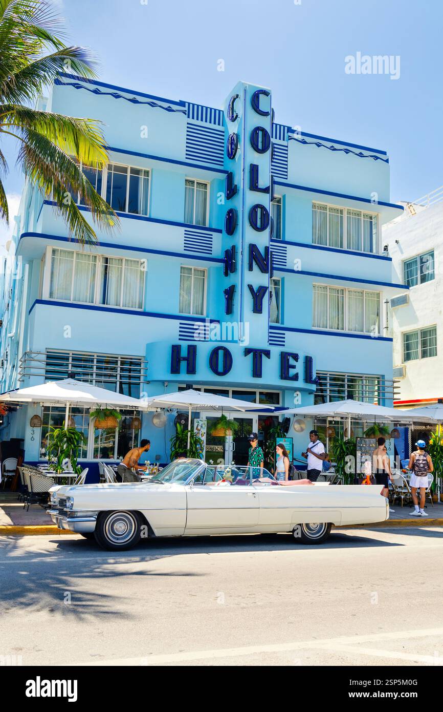 Exterior of art deco Colony Hotel and retro vintage car 1964 Cadillac ...
