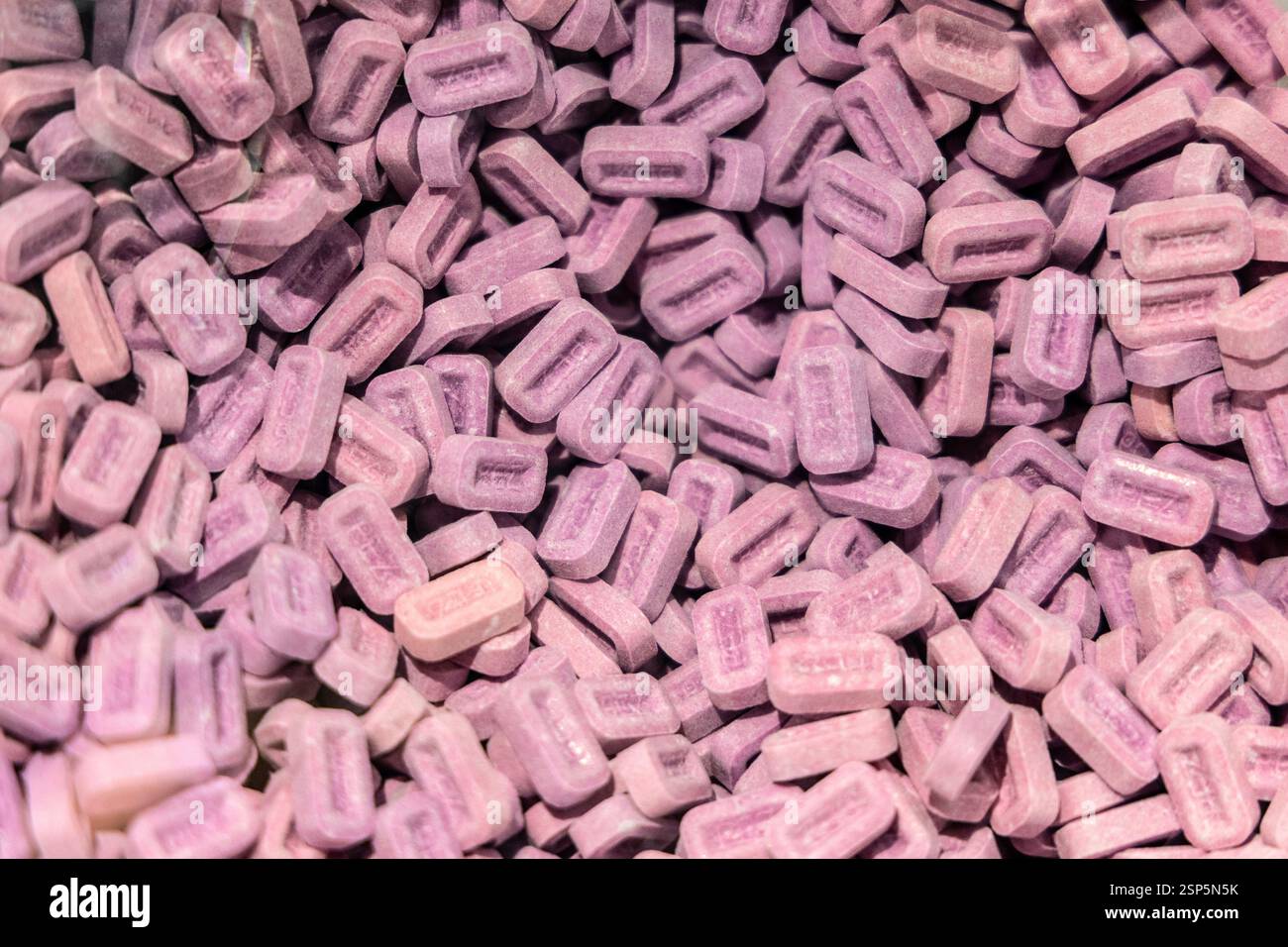 Grape flavour Pez candy background Stock Photo - Alamy