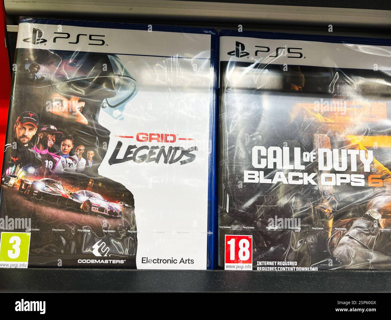 Lviv, Ukraine - February 13, 2025: PS5 game cases showcasing diverse ...