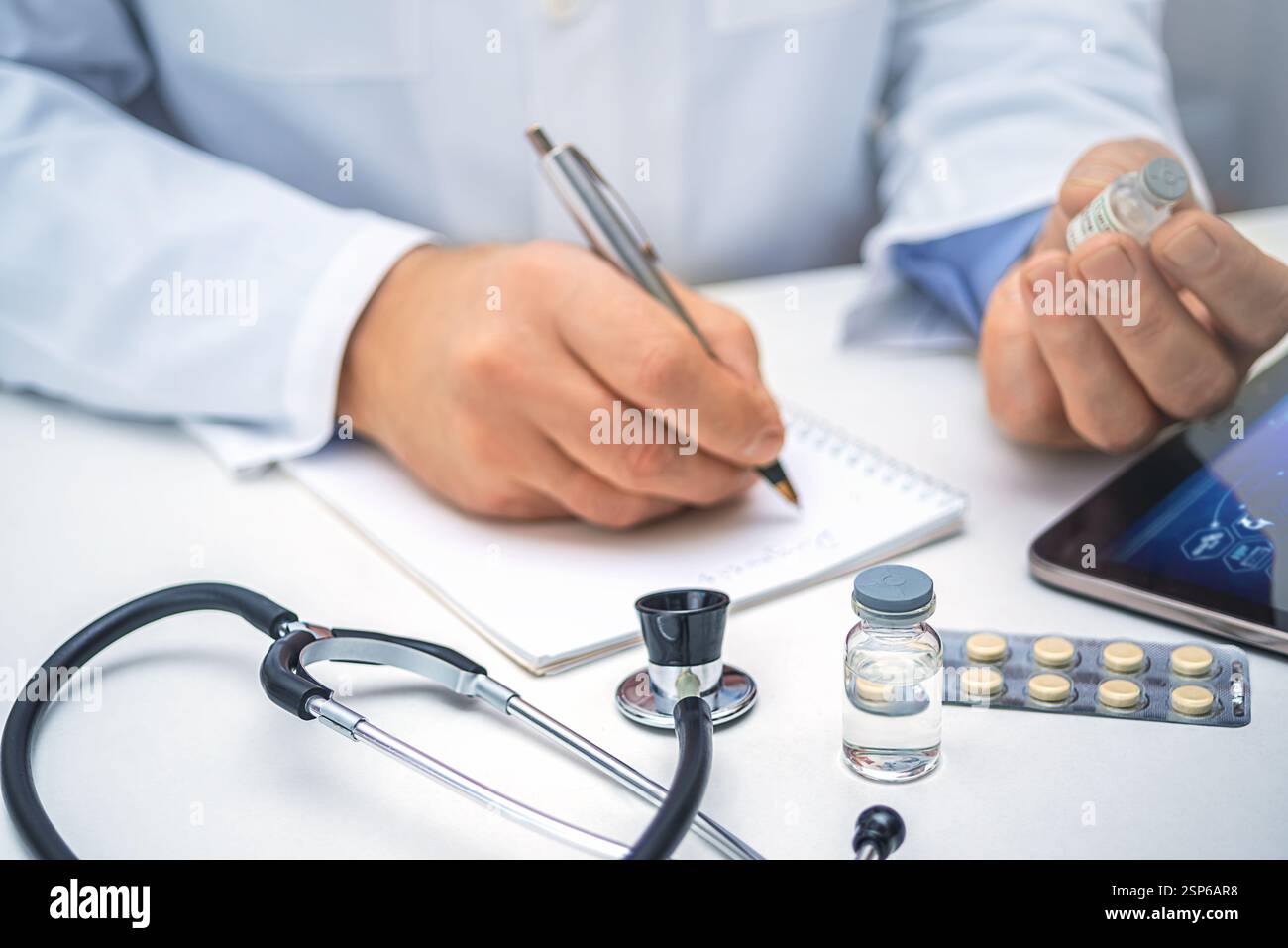 Healthcare worker writing patient notes hi-res stock photography and ...