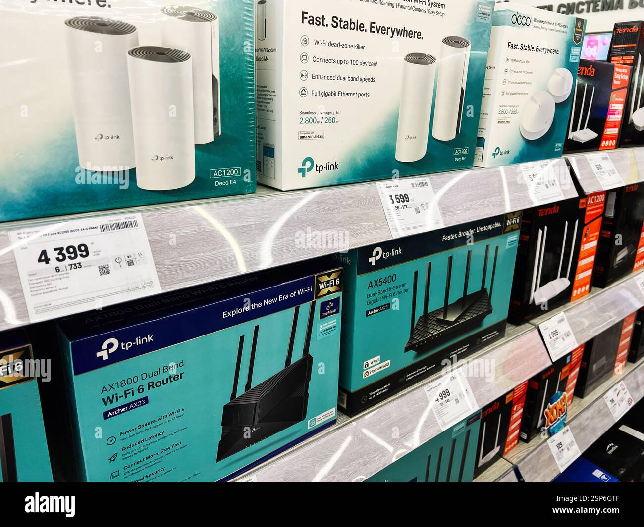 Lviv, Ukraine - February 13, 2025: Display of various WiFi router ...