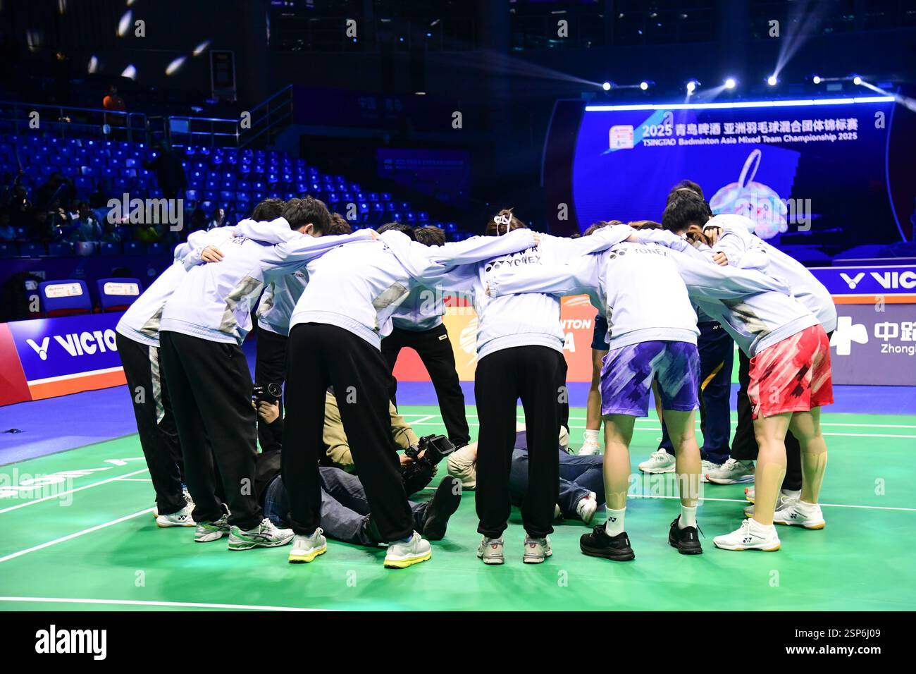 QINGDAO, CHINA - FEBRUARY 14, 2025 - Chinese players Li Hong YI and BAO Li Jing VS TANG Chun Man ...