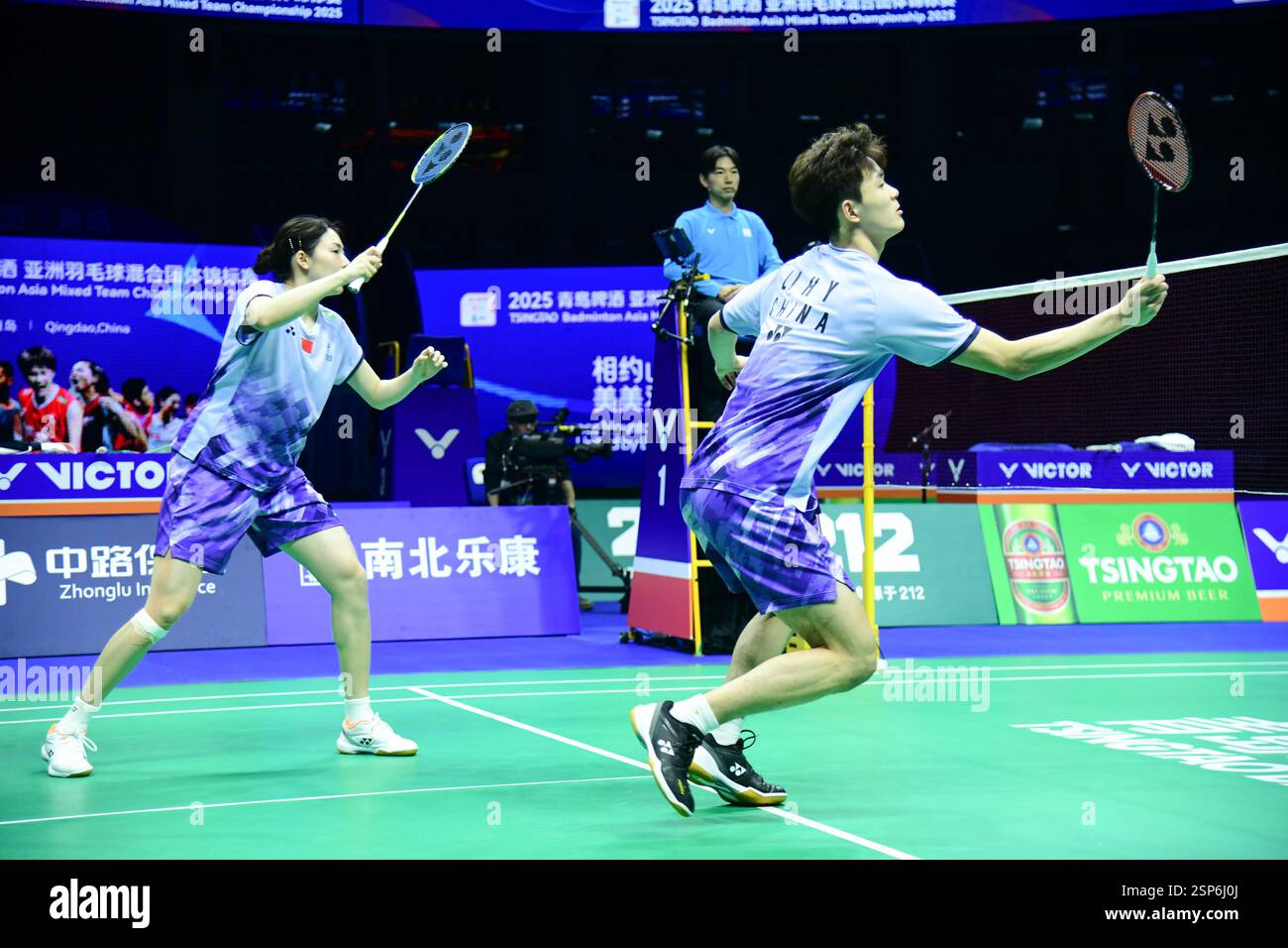 QINGDAO, CHINA - FEBRUARY 14, 2025 - Chinese players Li Hong YI and BAO Li Jing VS TANG Chun Man ...