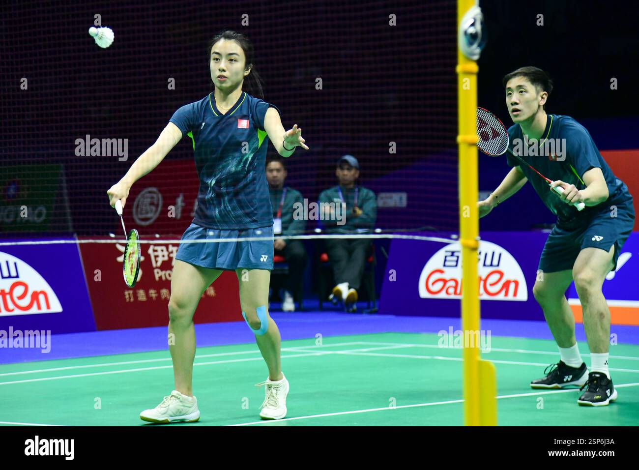 QINGDAO, CHINA - FEBRUARY 14, 2025 - Chinese players Li Hong YI and BAO Li Jing VS TANG Chun Man ...