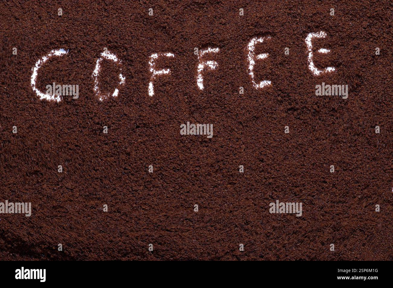 The word Coffee in brown coffee powder Stock Photo - Alamy