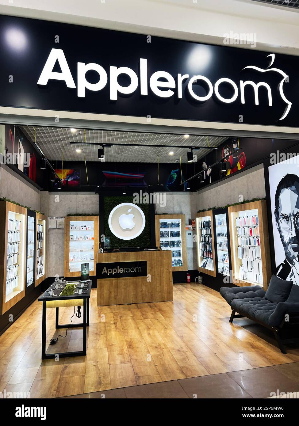 Lviv, Ukraine - February 13, 2025: Electronic Apple room shop interior ...