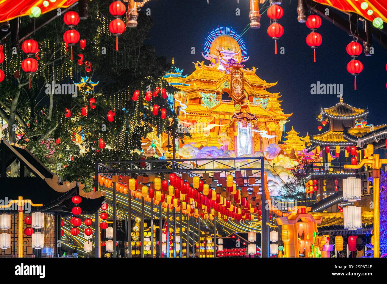 Tourists celebrate the Lantern Festival at the Zigong International ...