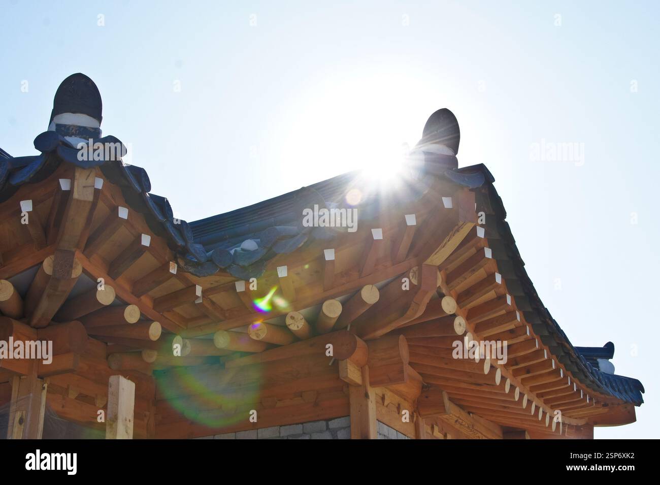 Korean Roof. Gently curved wooden beams with tiled roof. Symbol of ...