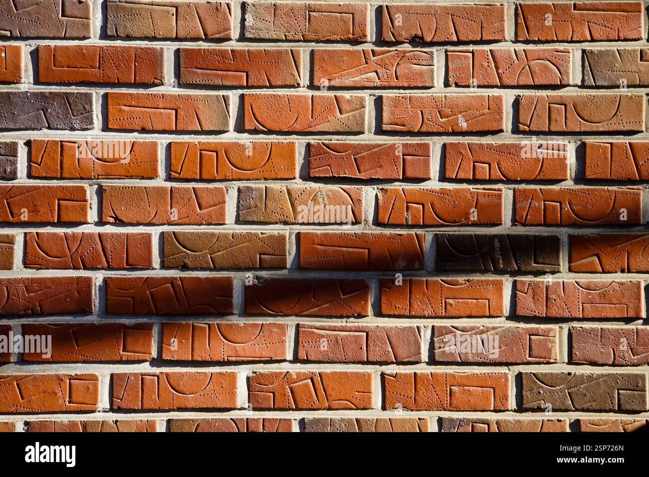Brick wall. Patterned bricks with shadows. Intricate design. Symbolic ...