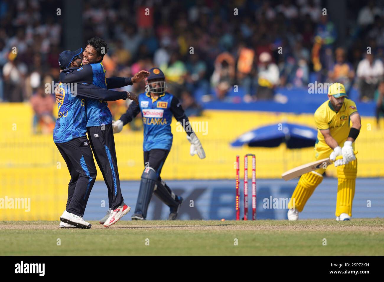 Sri Lanka's Danith Wellalage celebrates the wicket of Australia's Glenn ...
