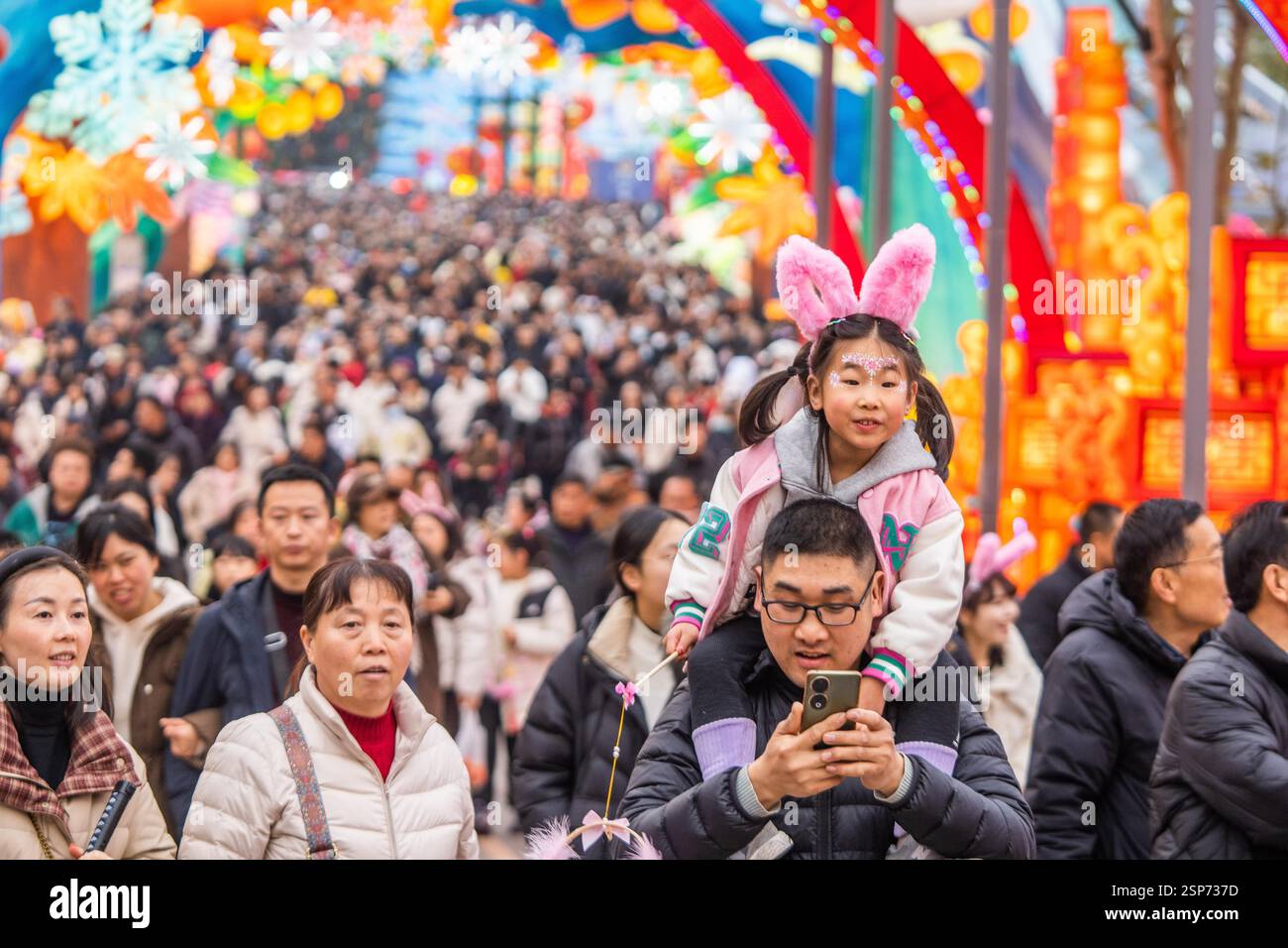 Tourists celebrate the Lantern Festival at the Zigong International ...