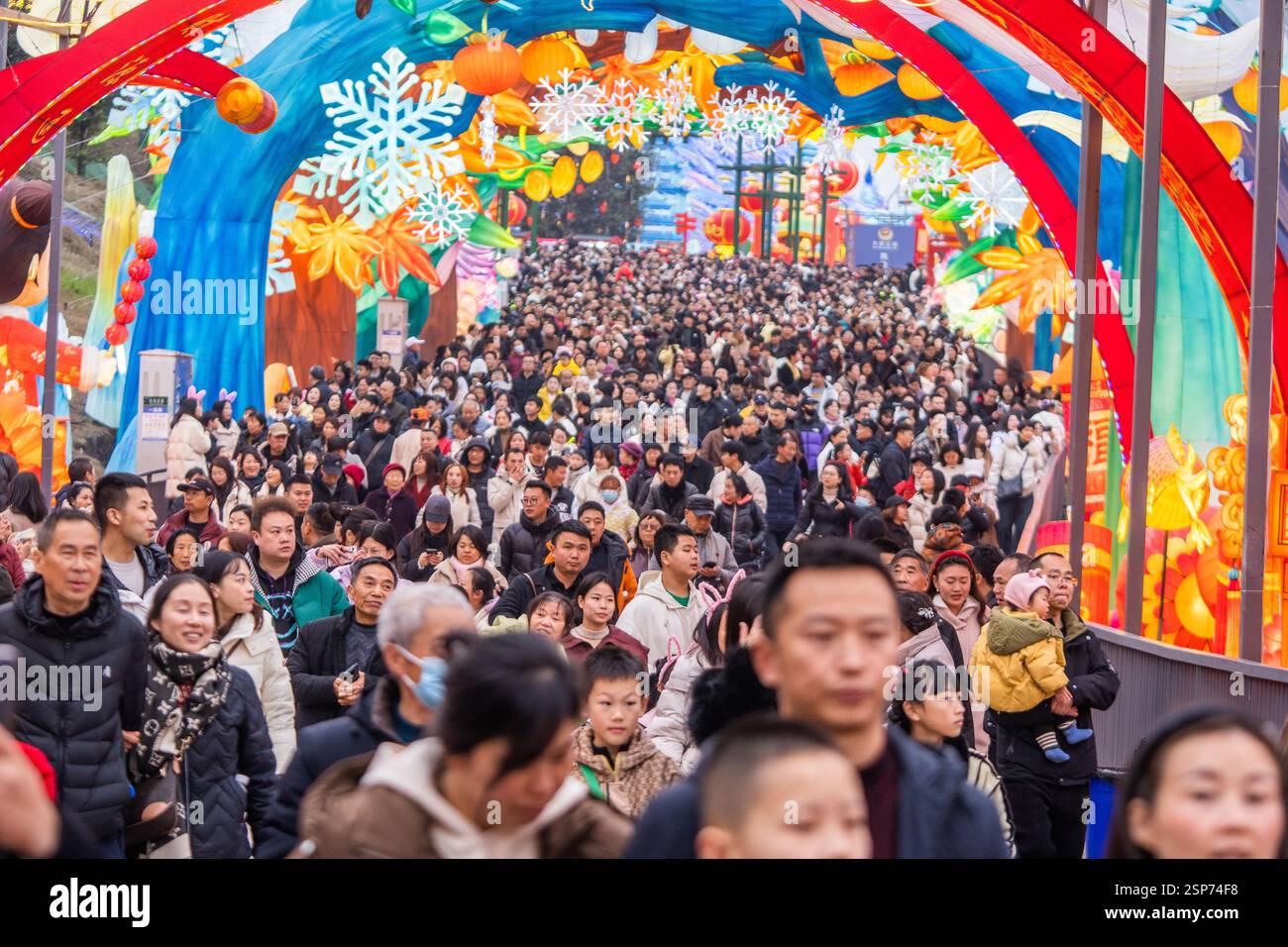 Tourists celebrate the Lantern Festival at the Zigong International ...