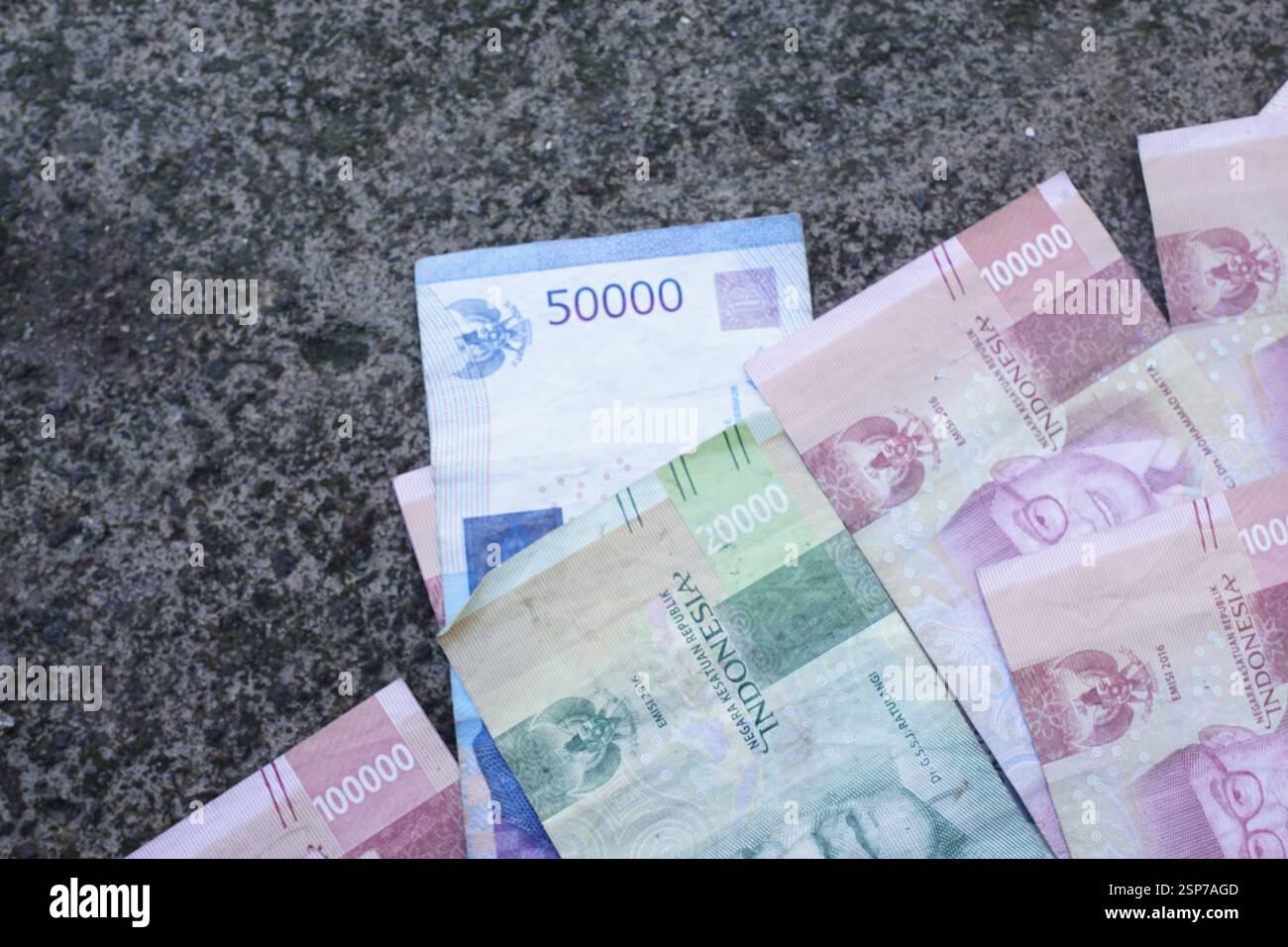 Indonesian money is neatly lined up with various denominations Stock ...