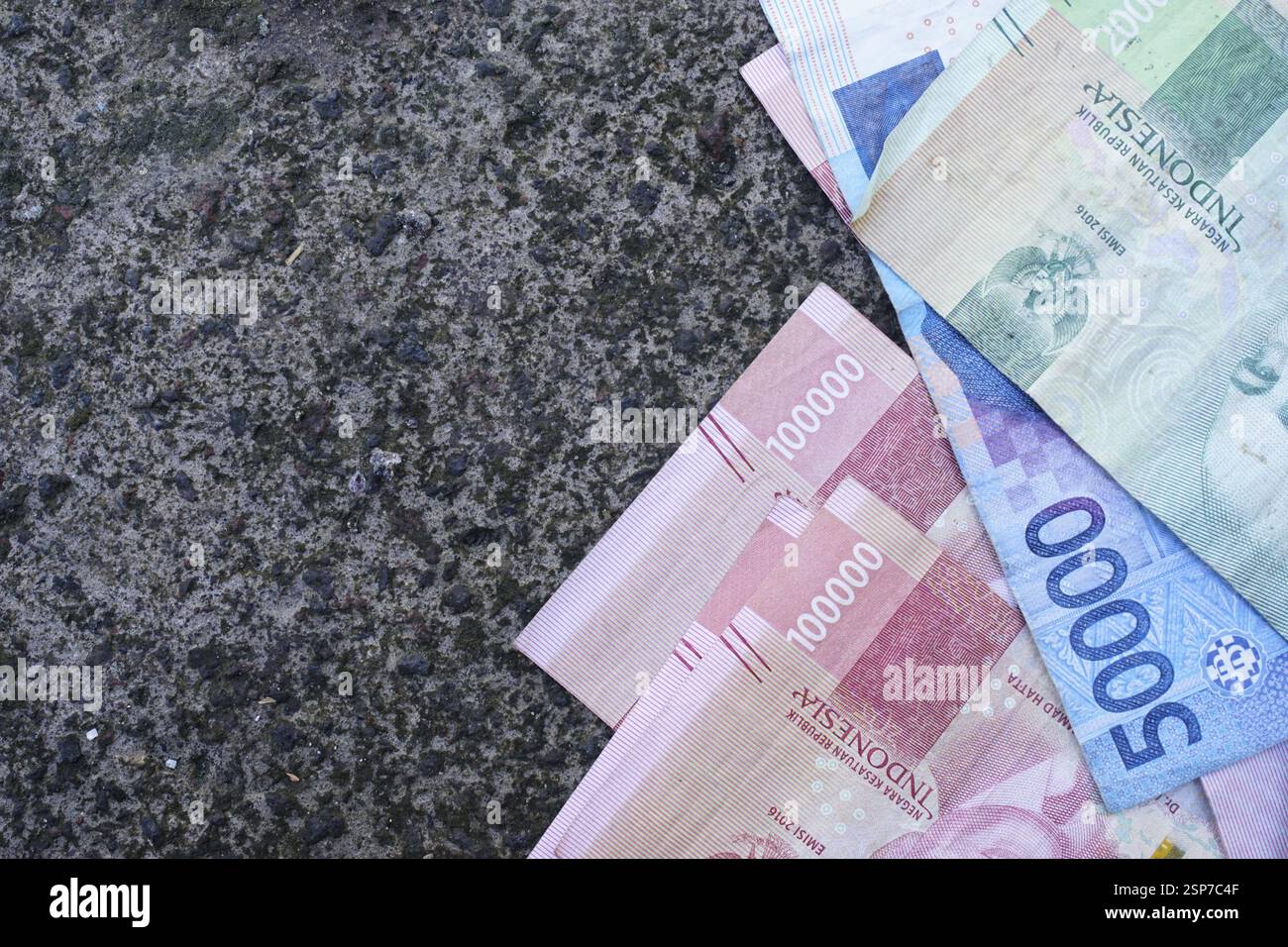 Indonesian money is neatly lined up with various denominations Stock ...