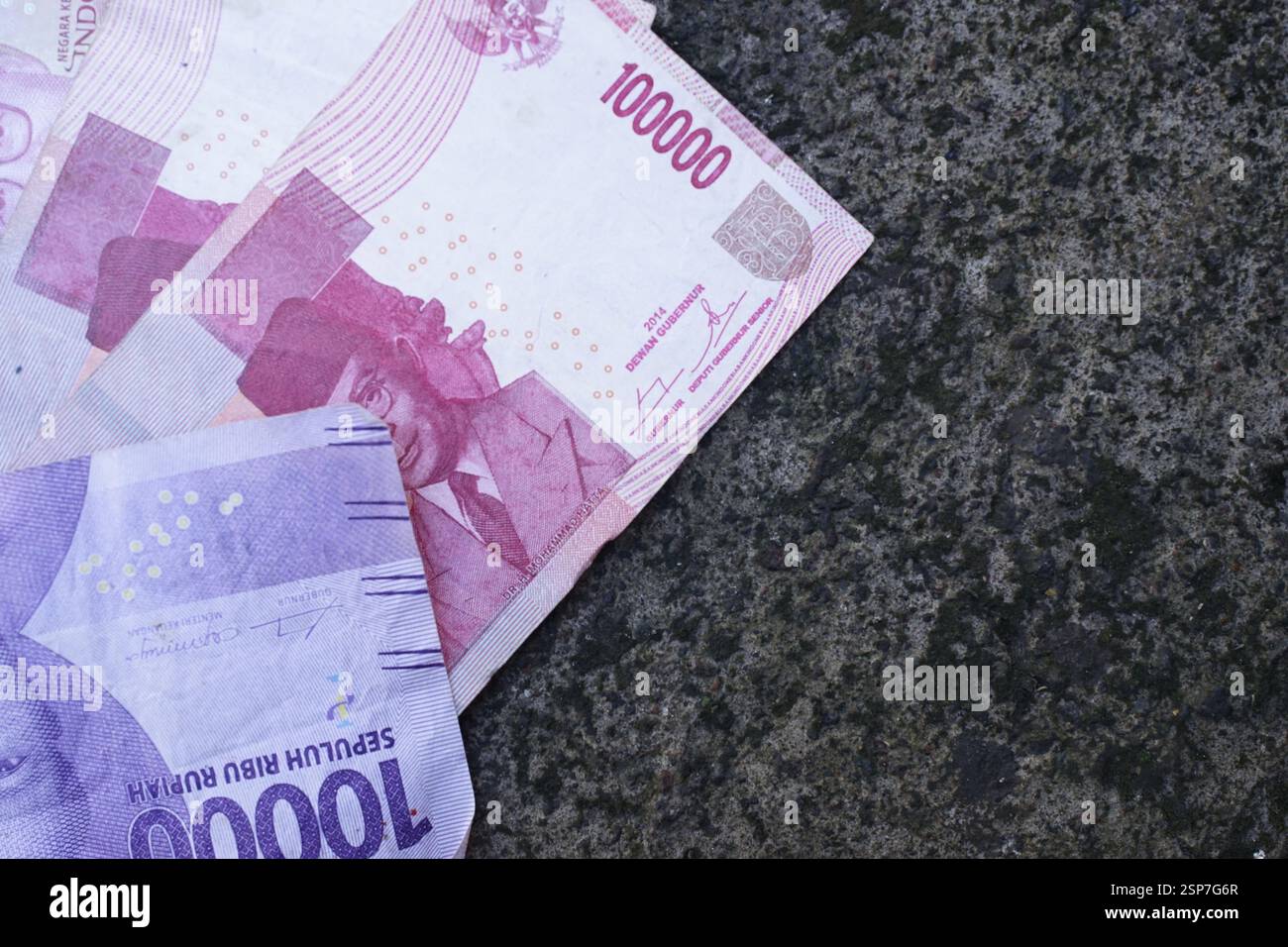 Indonesian money is neatly lined up with various denominations Stock ...