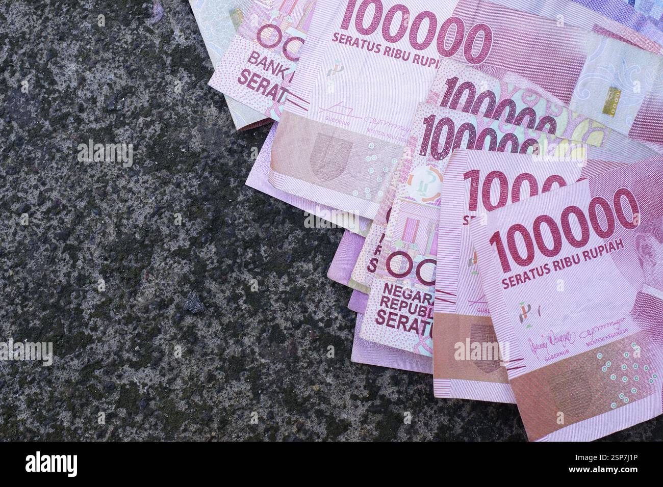 Indonesian money is neatly lined up with various denominations Stock ...