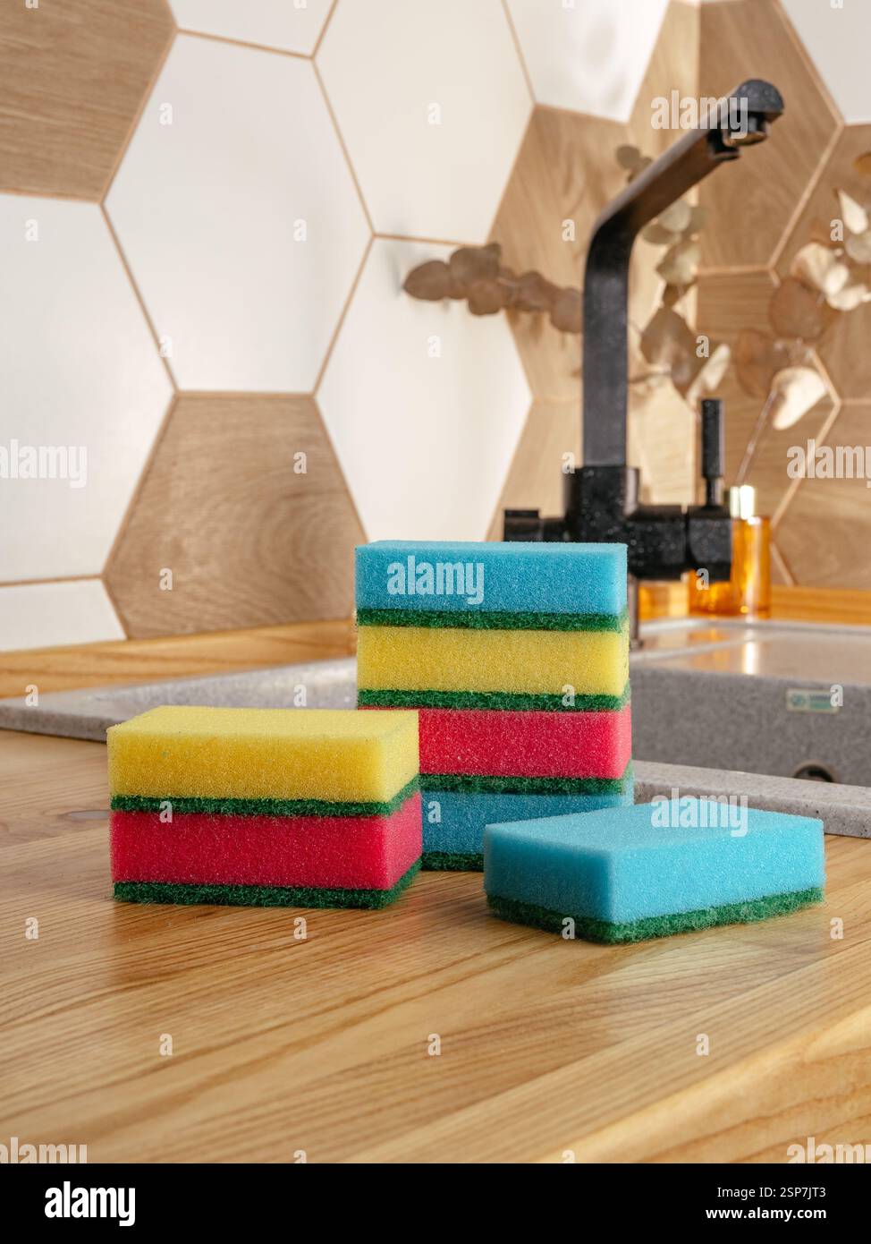sponges for washing dishes in the kitchen Stock Photo - Alamy
