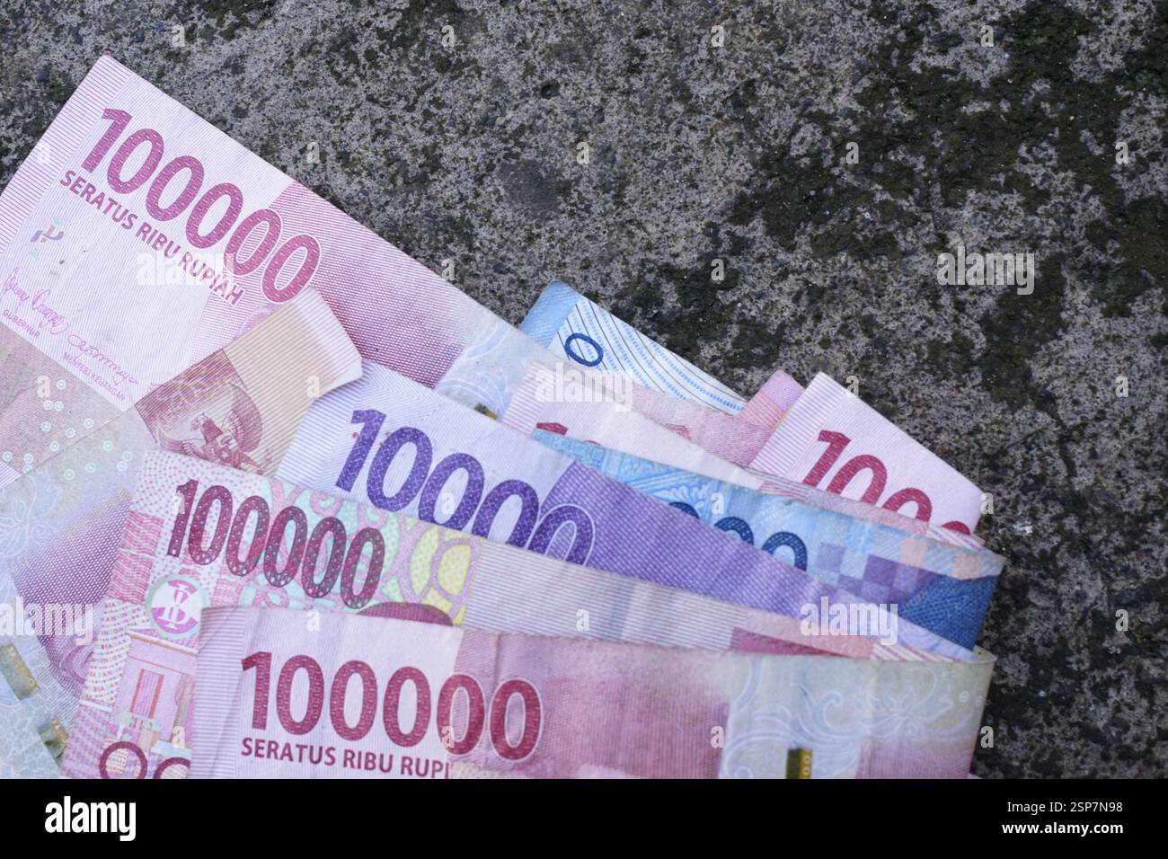 Indonesian money is neatly lined up with various denominations Stock ...