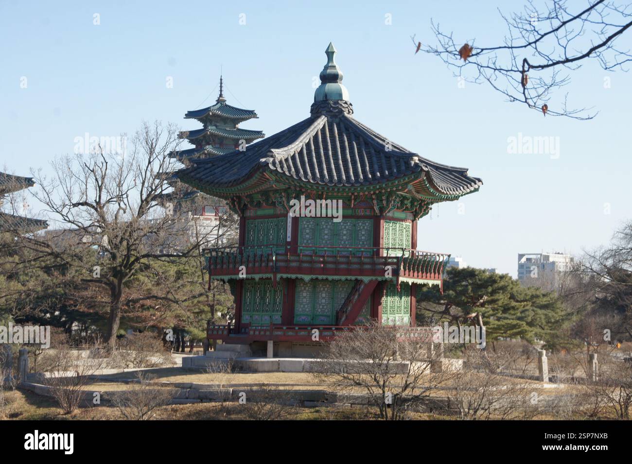 Hyangwonjeong Pavilion South Korea. Multi-tiered roof, green and red ...