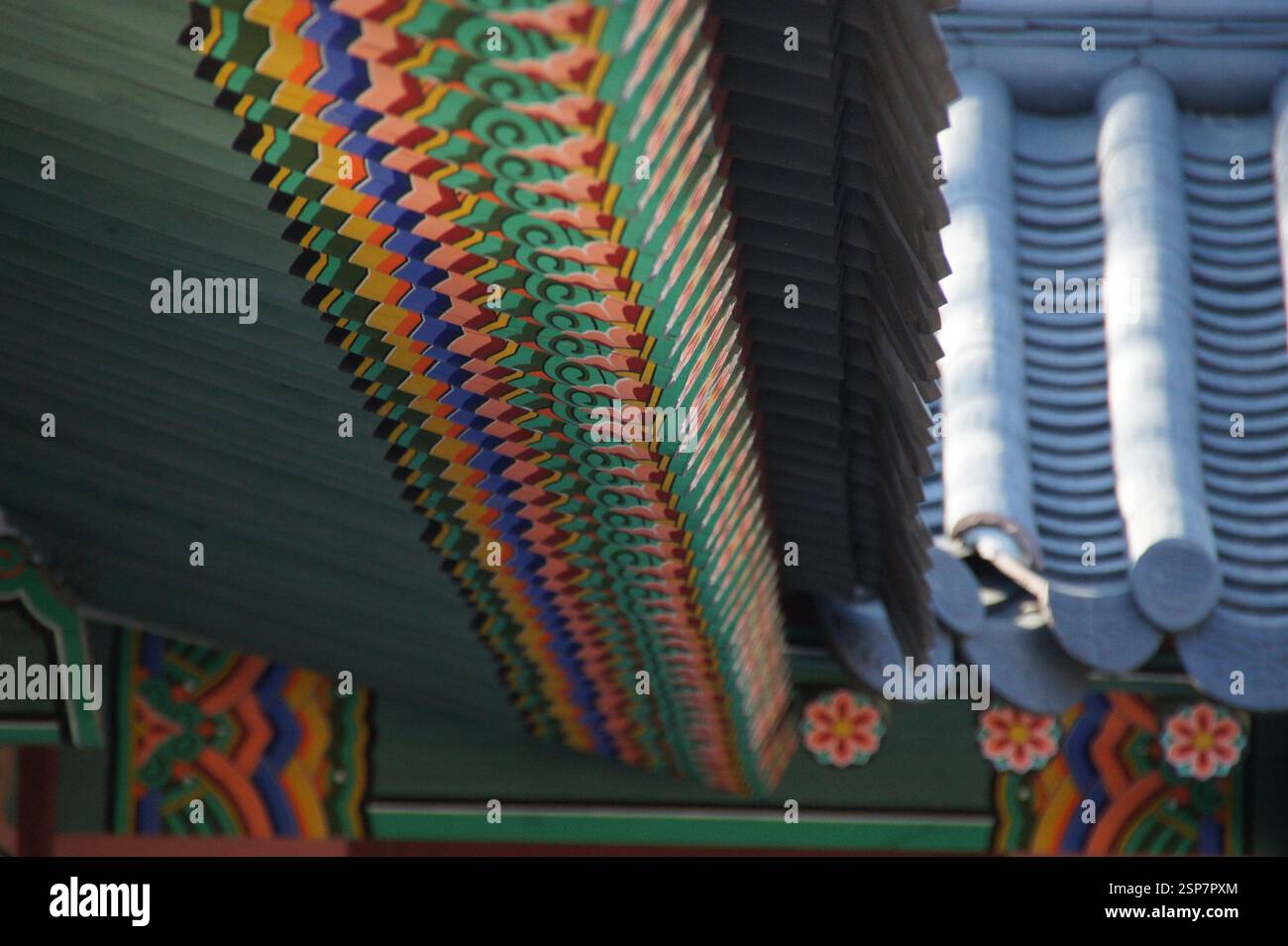 Roof detail. Colorful wooden panels with intricate patterns ...
