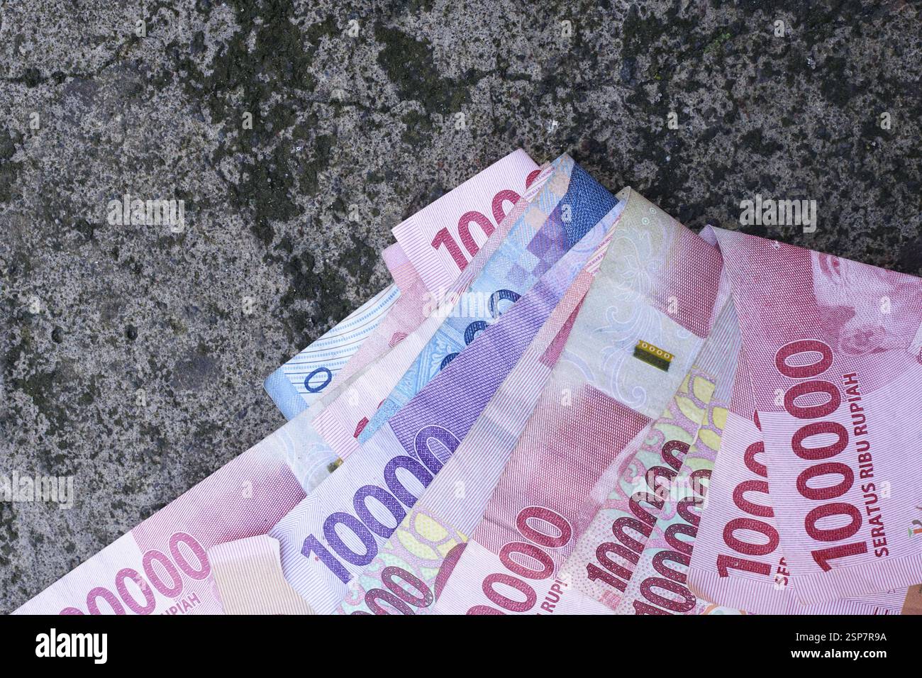 Indonesian money is neatly lined up with various denominations Stock ...