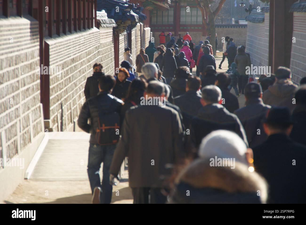 The street is bustling with activity as people go about their daily ...