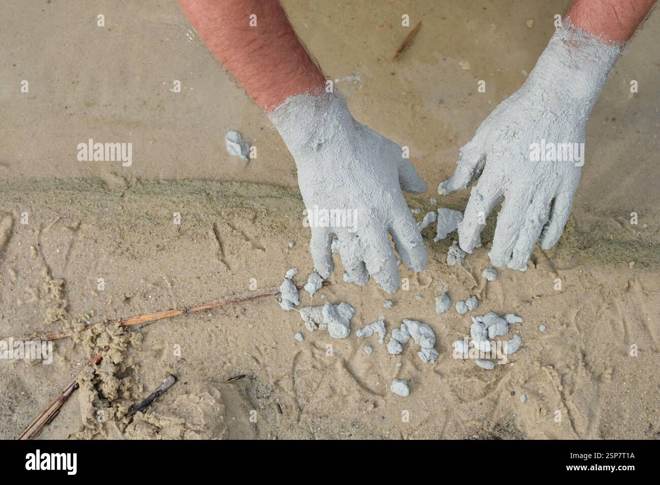 Human hands with clay. Mud baths with blue clay. Unique blue clay from ...