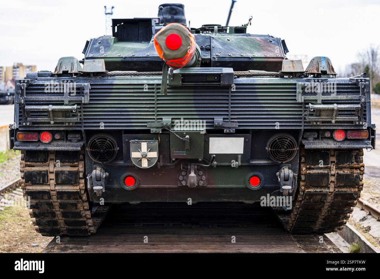 A rear view of a German Leopard 2 main battle tank loaded on a flatbed ...