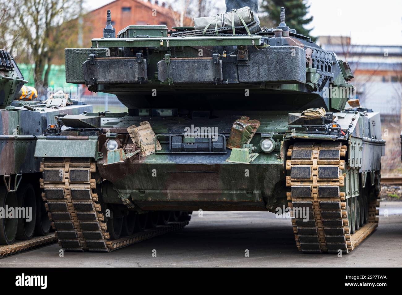 A rear view of a German Leopard 2 main battle tank loaded on a flatbed ...